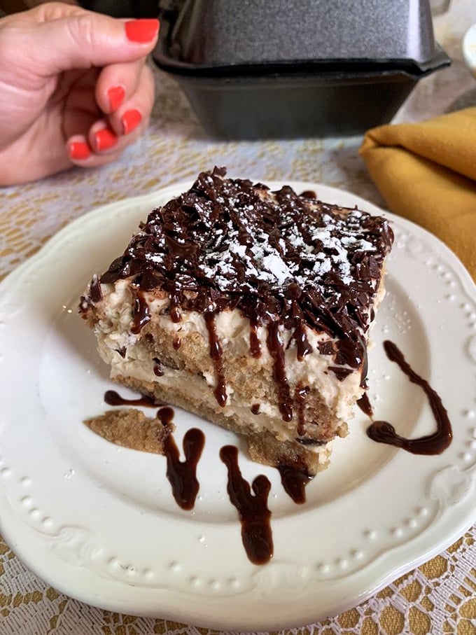 Tiramisu that would make your Italian grandmother weep with joy—layers of espresso-soaked ladyfingers and mascarpone under a dusting of cocoa.