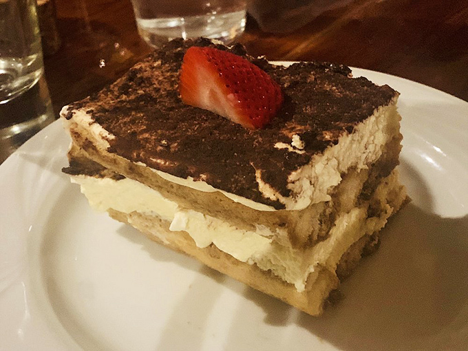 That's tiramisu with a strawberry on top, proving that some Italian desserts are worth loosening your belt for.