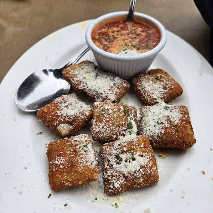 St. Louis's gift to the world: toasted ravioli. Crispy on the outside, tender within, and that dusting of Parmesan? Pure genius.