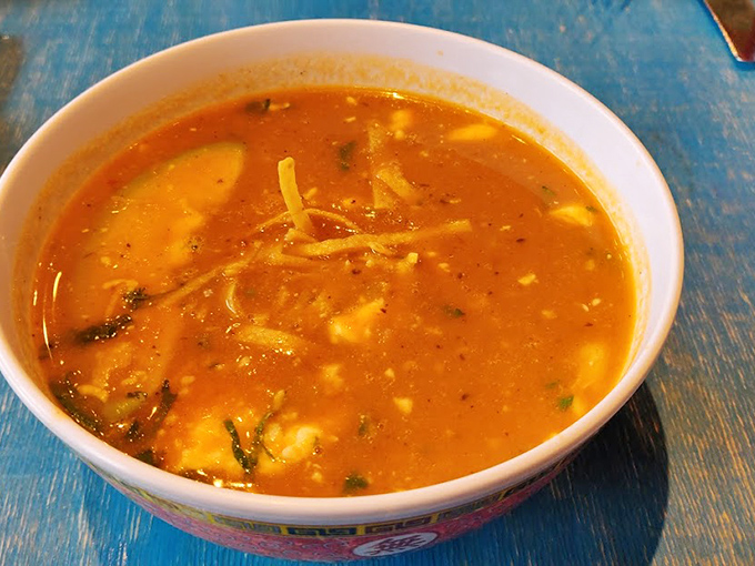 This tortilla soup isn't just broth&mdash;it's a warm, spicy swimming pool where corn, chicken, and vegetables throw the best flavor party in town.