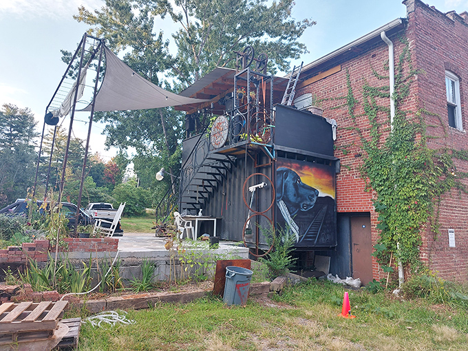 A lone rocking chair invites contemplation with downtown and mountains beyond. It's the kind of spot where great novels are imagined but rarely written.