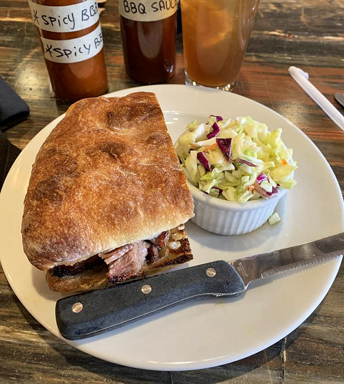 A tri-tip sandwich that demands to be photographed before eating, then makes you forget your phone exists once you take that first bite.
