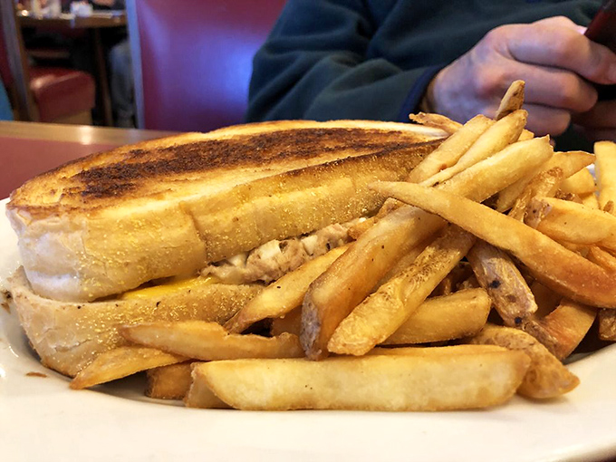 The humble grilled sandwich &ndash; elevated to art form. Crispy on the outside, melty on the inside, with fries that could make a potato proud.