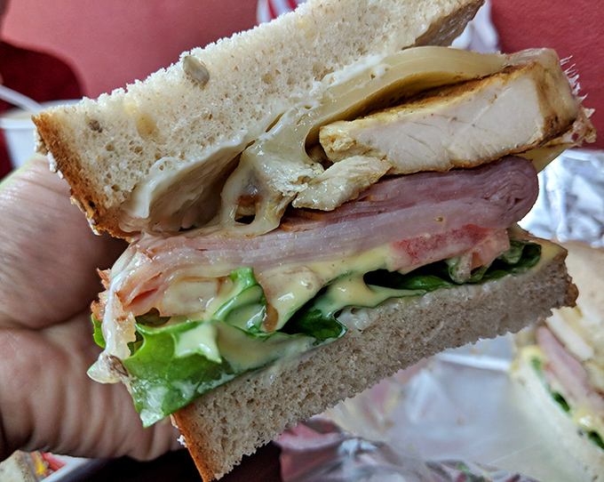 The club sandwich: mankind's greatest achievement since the wheel. Three layers of bread creating the perfect vehicle for turkey, ham, and happiness.