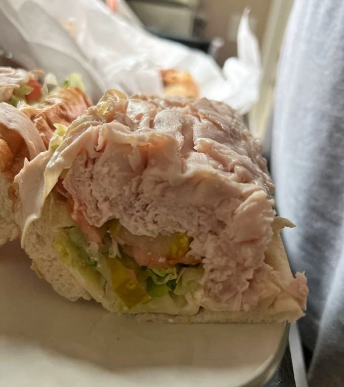 The turkey hoagie—for when you want to pretend you're making healthier choices. That stack of meat could feed a small family reunion.