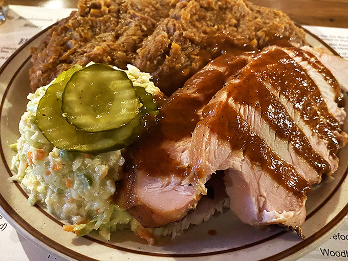 The turkey at Sconyers defies physics – somehow remaining impossibly moist while soaking up all that smoky goodness. Science should study this.