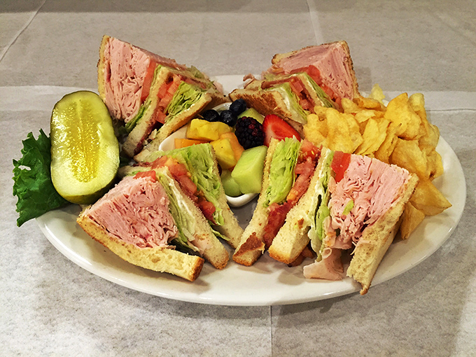 The club sandwich &ndash; architecture you can eat! Layers of turkey, bacon, and fresh veggies create the skyscraper of satisfaction.