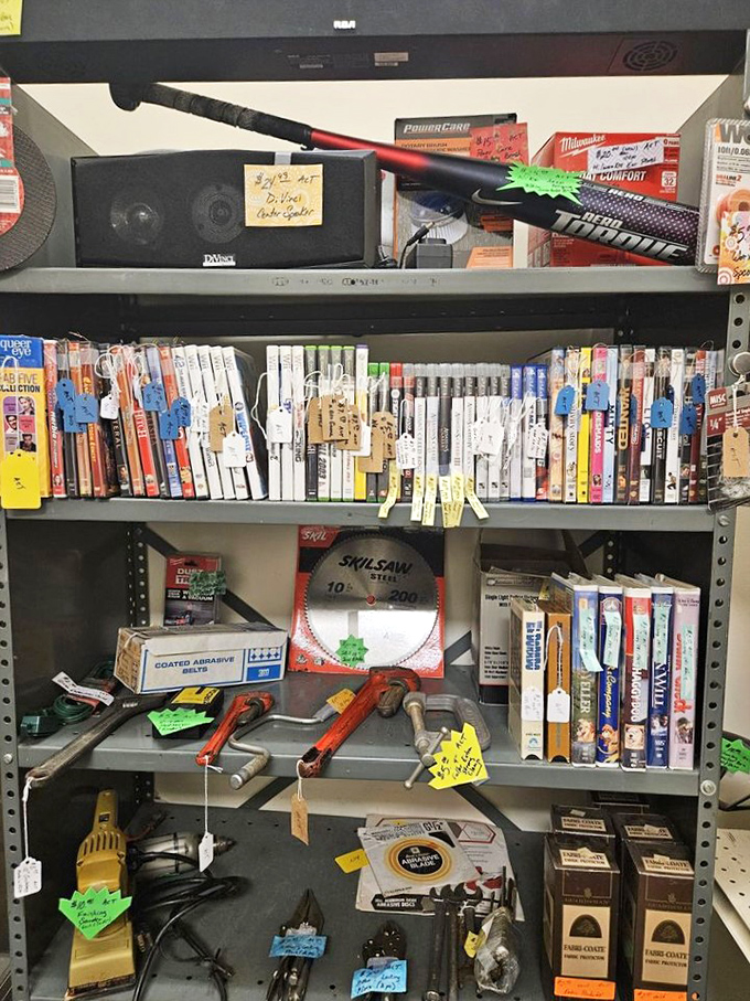 A DIYer's dream corner where vintage tools meet entertainment. That baseball bat is just waiting for its Field of Dreams moment.
