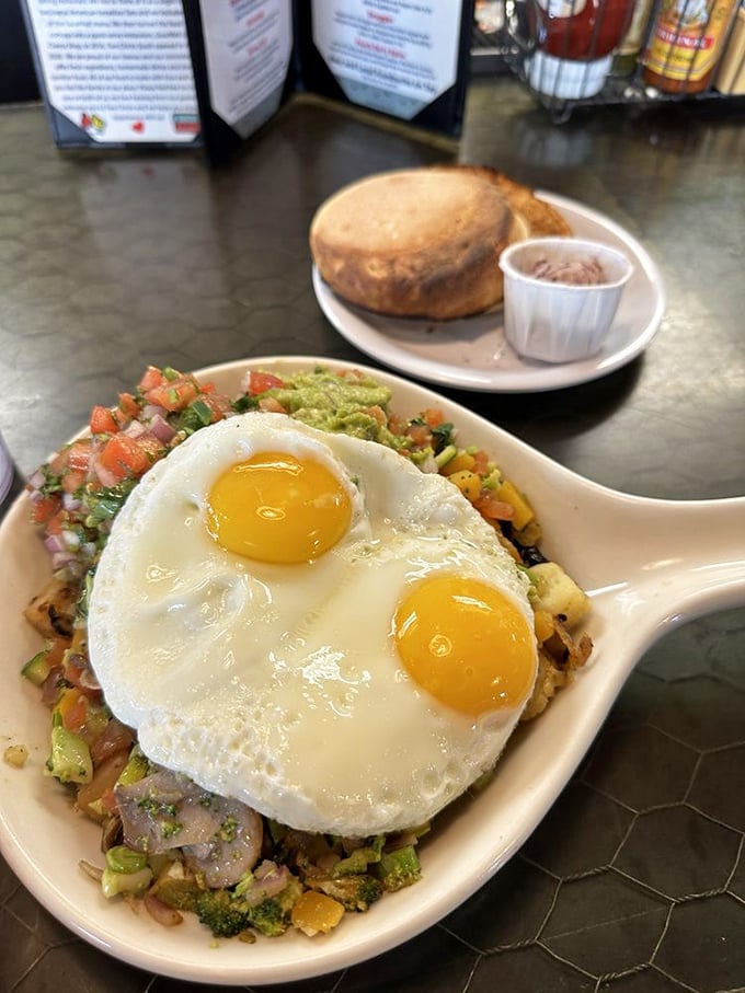 A veggie-packed skillet topped with perfectly fried eggs proves that healthy can still be indulgent in the right hands.