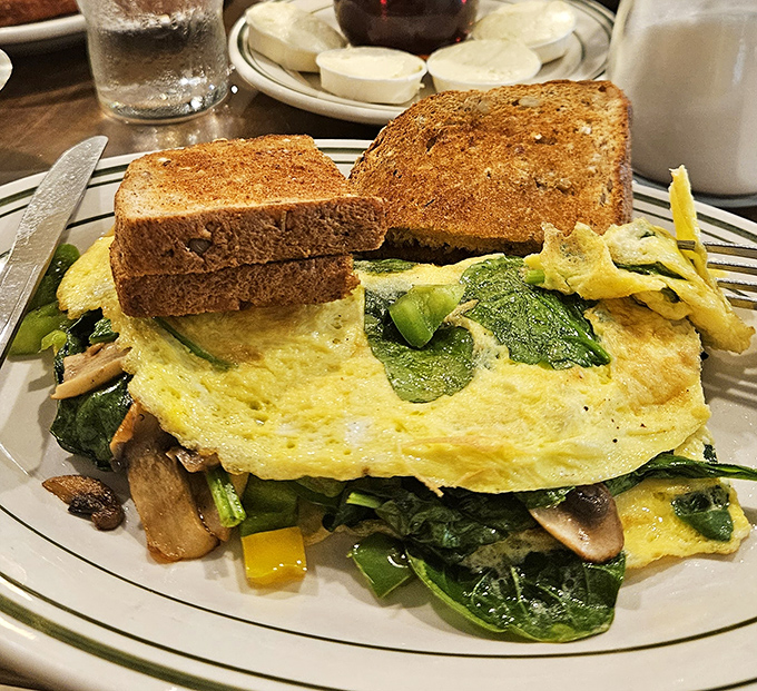 This veggie-packed omelet on wheat toast proves healthy eating doesn't have to mean sacrificing flavor or satisfaction at breakfast.