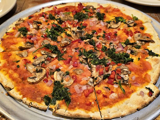 Pizza that doesn't hide behind excess cheese, letting fresh vegetables and herbs take center stage. Your mouth is already practicing its thank-you speech.