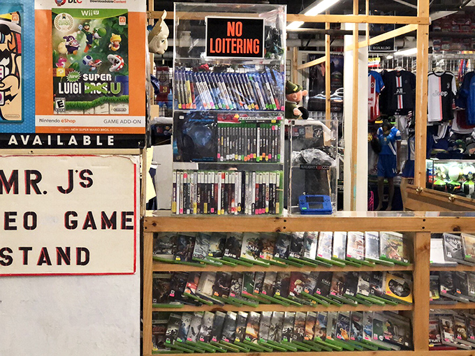 Mr. J's Video Game Stand&mdash;where yesterday's cutting-edge technology becomes today's nostalgic treasure. Luigi looks as hopeful as the day he was pixelated.