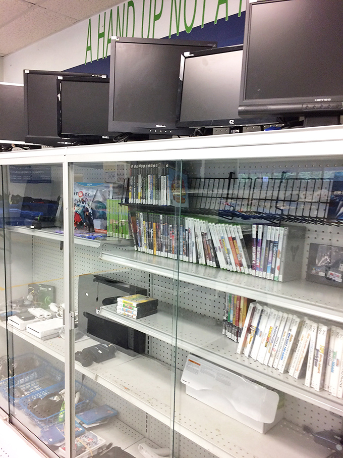 Gaming nostalgia and tech bargains behind glass&mdash;where yesterday's cutting-edge gadgets find new homes with budget-conscious enthusiasts.