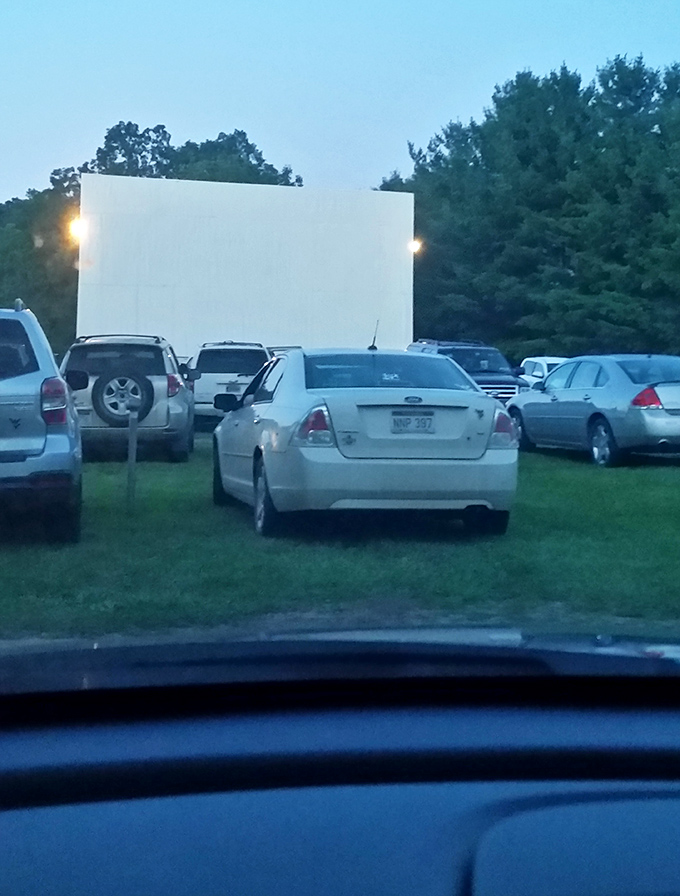 That magical moment when headlights dim and the screen illuminates. From this vantage point, even the back row feels like premium seating.