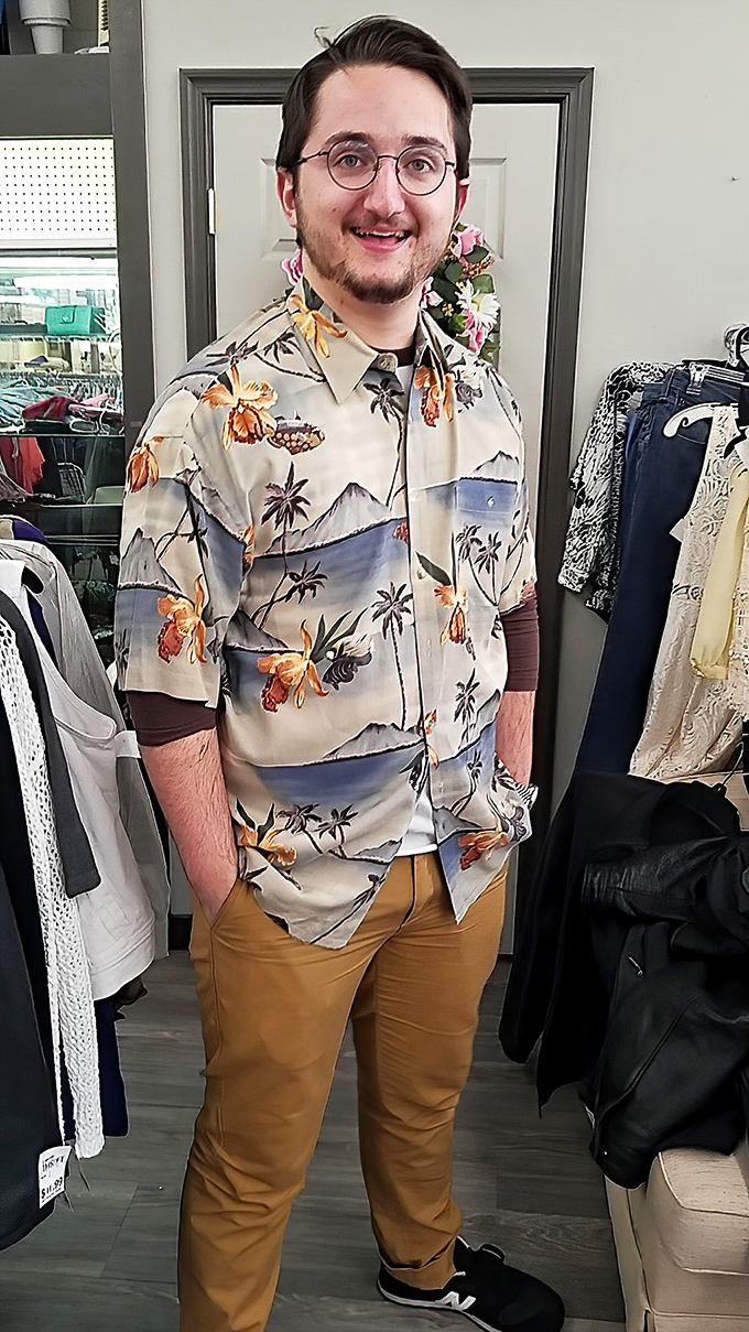 One shopper models a tropical shirt find that screams "vacation mode" without saying a word to your wallet.