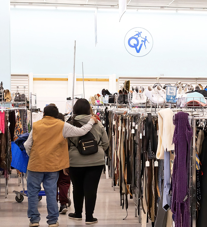 The universal shopping stance: leaning in to inspect potential treasures like archaeologists discovering ancient artifacts.