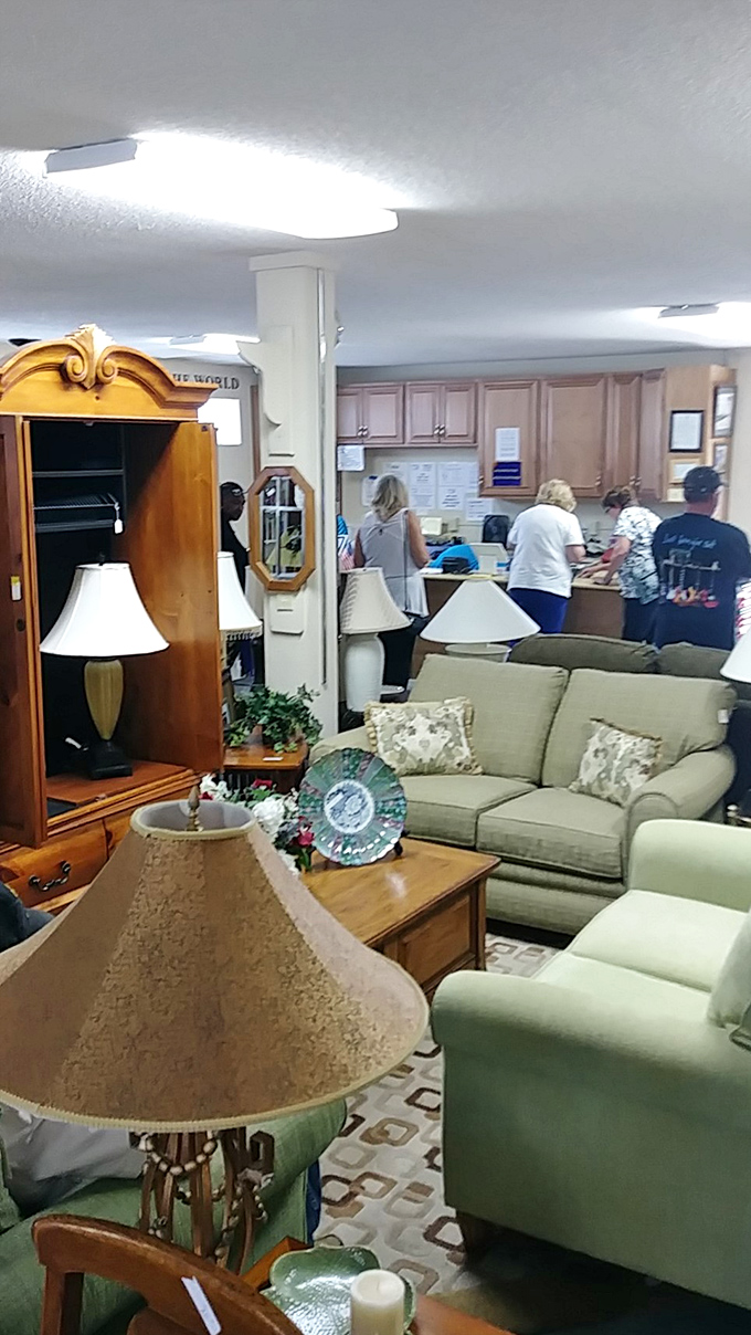 The furniture section could furnish an entire living room for less than the cost of a designer throw pillow. That beige sofa has "nap potential" written all over it.