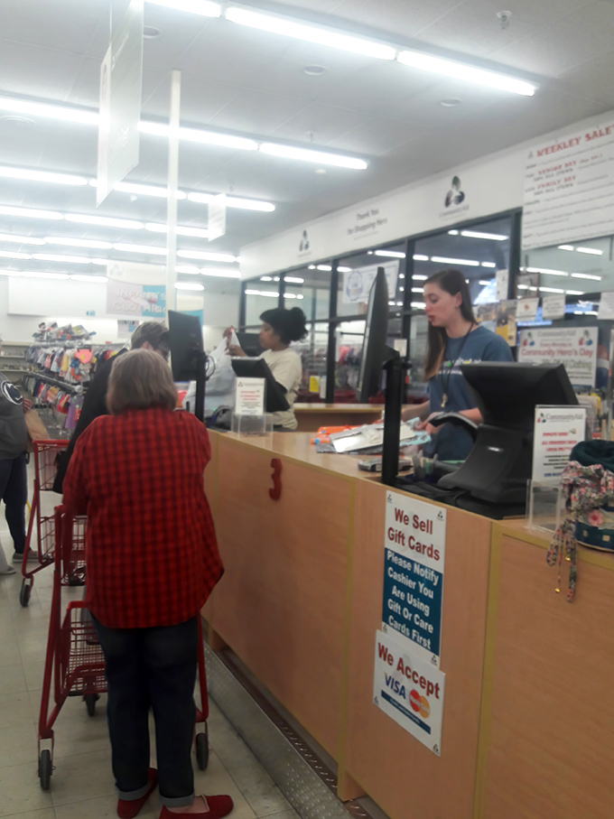 The checkout experience: where shoppers discover their $34 somehow transformed into bags of necessities and at least one "just because" find.