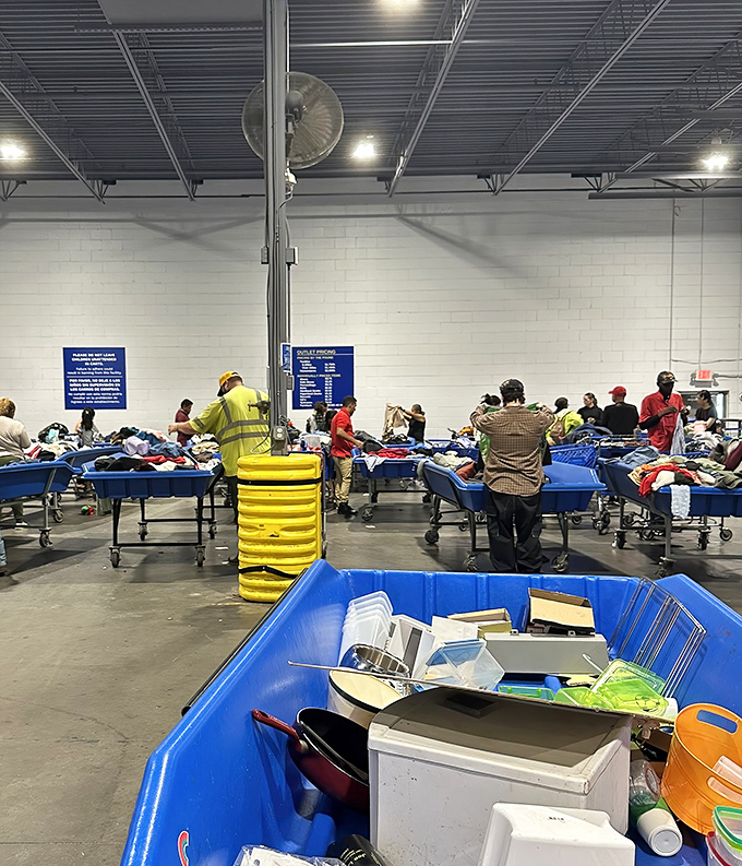 Treasure hunters in their natural habitat, sifting through blue bins of possibility. Each person searching for their own version of retail nirvana.