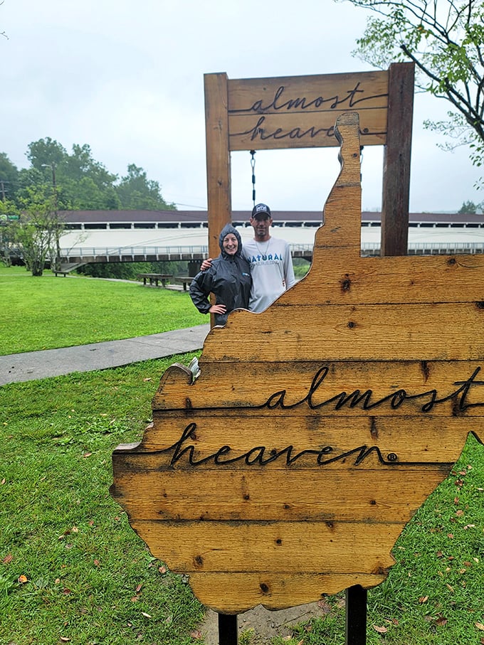 Even on rainy days, the "Almost Heaven" sign captures West Virginia's essence perfectly, with the historic bridge creating the ideal backdrop for memory-making moments.