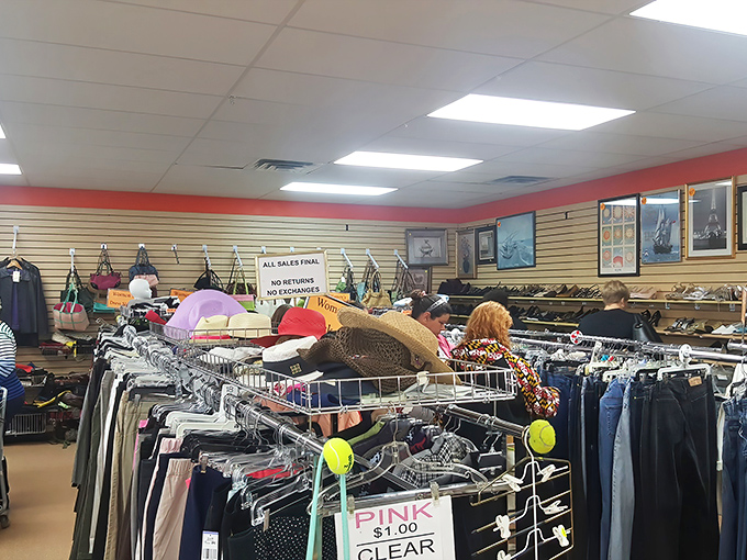 Shoppers navigate the clothing forest with the focus of archaeologists, knowing that designer labels often hide between everyday finds.