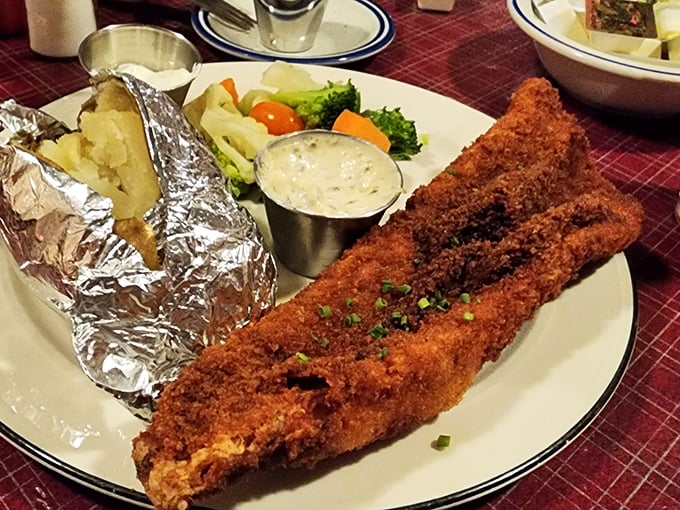 That walleye dinner isn't messing around&mdash;crispy, generous, and served with a baked potato wrapped in foil like a delicious present. 
