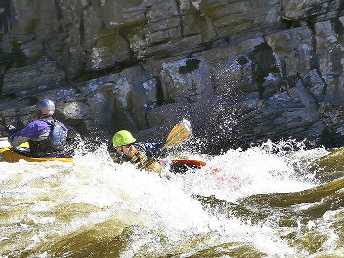 Whitewater warriors navigate Tohickon Creek's challenging rapids. Like life's obstacles, sometimes you paddle through, sometimes you get splashed.
