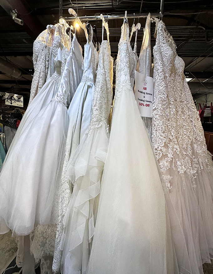 Wedding gowns at fraction-of-retail prices hang like elegant ghosts of celebrations past, waiting for their "something borrowed" moment.