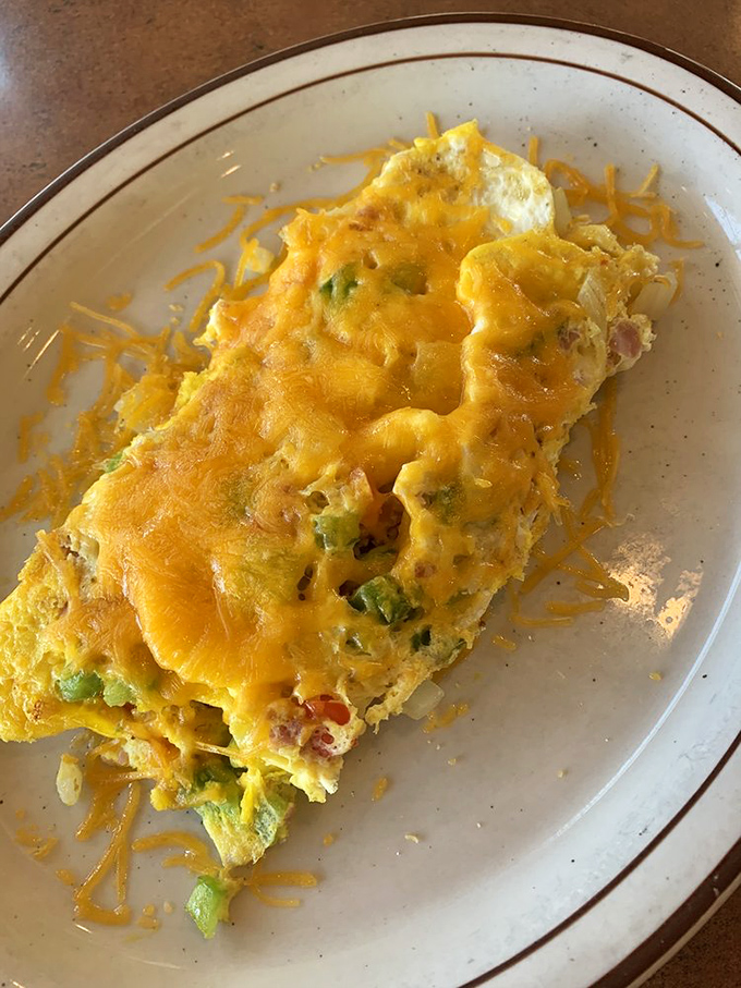 This Western Omelet isn't just breakfast&mdash;it's a sunrise fiesta of peppers, ham, and cheese that puts ordinary eggs to shame.