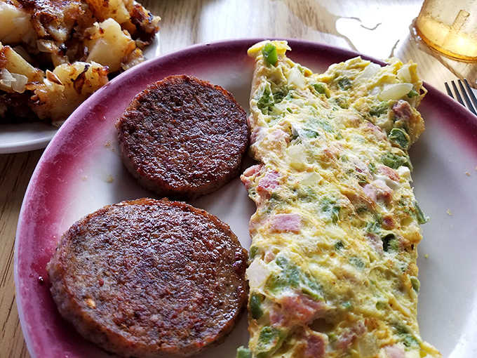 This Western omelet and scrapple combo isn't just breakfast&mdash;it's Maryland morning mythology on a plate, telling stories of simpler, more delicious times.