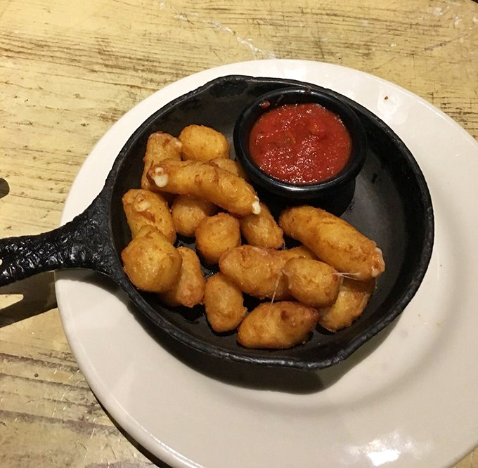 These White Cheddar Cheese Curds aren't just appetizers&mdash;they're little dairy grenades of happiness, served in a skillet that keeps them perfectly melty.
