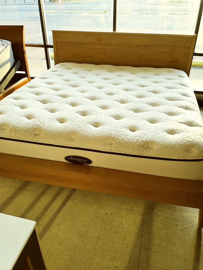 "Sleep like royalty on a commoner's budget." This barely-used mattress and wooden bed frame combo promises dreams without the financial nightmares.