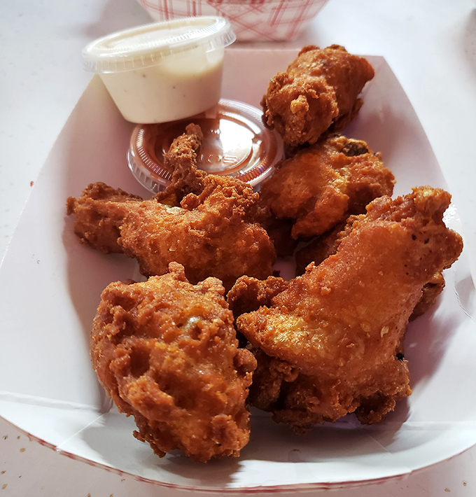 These wings aren't trying to be trendy or reinvent themselves. They're just perfectly crispy, gloriously golden, and unapologetically delicious.