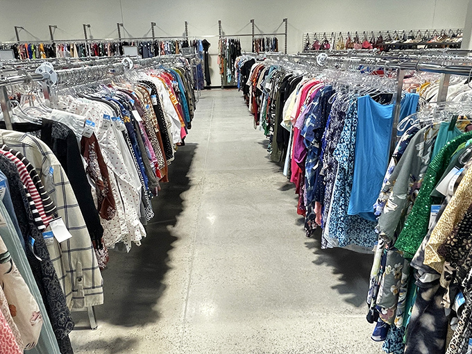 Clothing racks stretch toward the horizon like a textile rainbow, each garment waiting for its second chance to make a fashion statement.