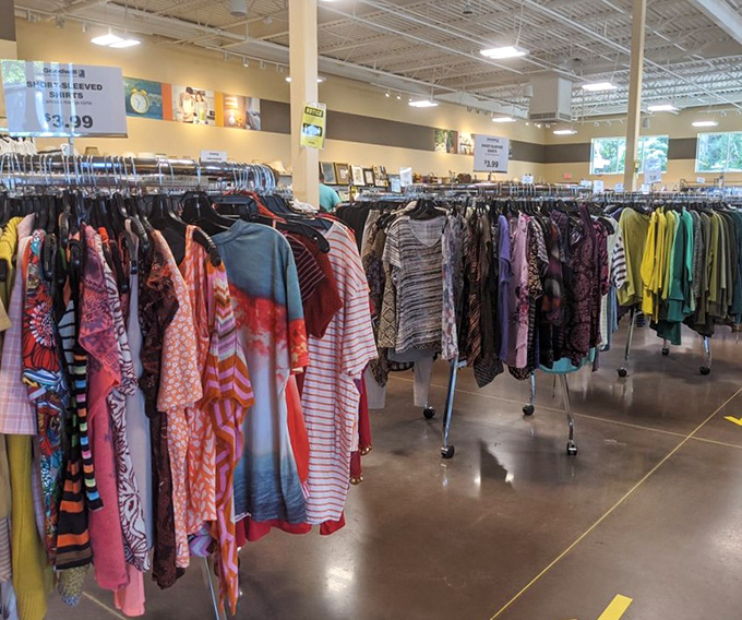 The women's section stretches into the horizon like a colorful sea of possibilities. Each rack holds someone's perfect outfit, patiently waiting to be discovered.