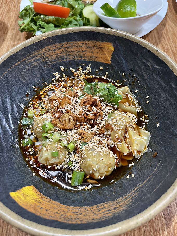 These wontons aren't just dumplings&mdash;they're little flavor bombs, perfectly dressed in a savory sauce and topped with sesame seeds that add just the right crunch.