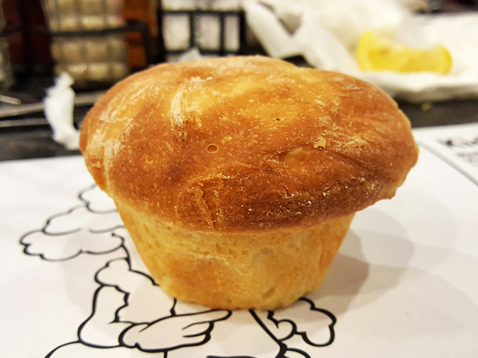 These yeast rolls arrive looking like edible clouds, ready to soak up every drop of gravy goodness.