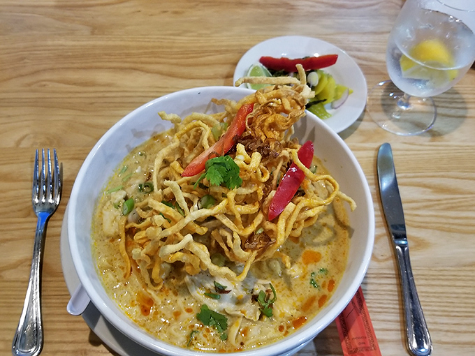 This yellow curry noodle soup arrives like sunshine in a bowl &ndash; complete with crispy noodle crown that adds textural fireworks to every spoonful.