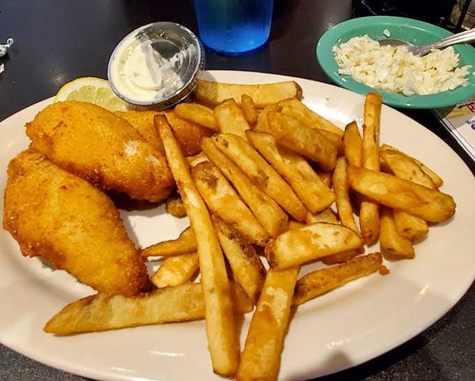 Yellow perch, the walleye's smaller cousin, gets the royal treatment here&mdash;fried to golden perfection and served with fries that could start their own fan club.
