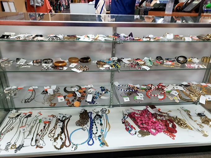 The jewelry counter sparkles with possibilities—costume pieces that could be conversation starters or secret vintage scores.