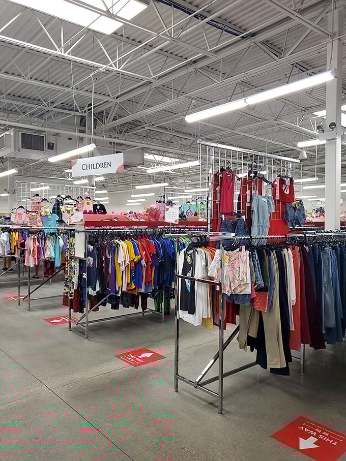The children's section explodes with color like a rainbow after a retail storm. Tiny fashions at tiny prices make parents' wallets breathe easier.