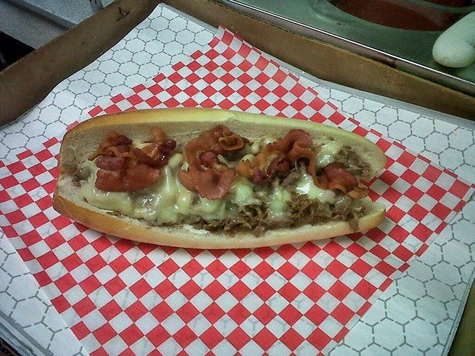 Savor the flavor at Barry’s Steaks and Hoagies, where melty cheese, crispy bacon, and tender steak make every bite unforgettable.