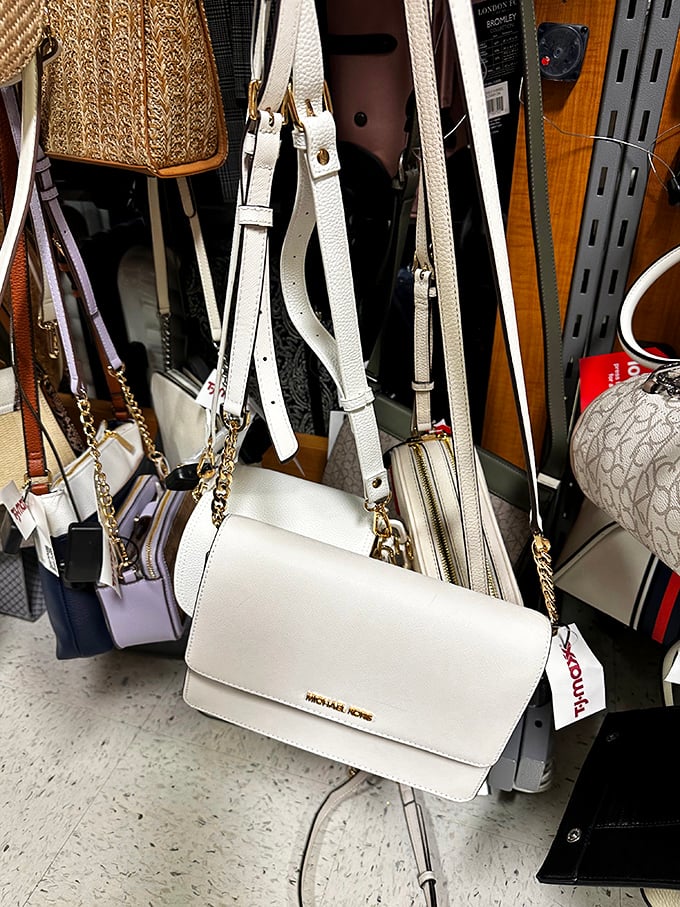 A treasure trove of Michael Kors handbags dangles enticingly, proving that arm candy doesn't have to break the bank.