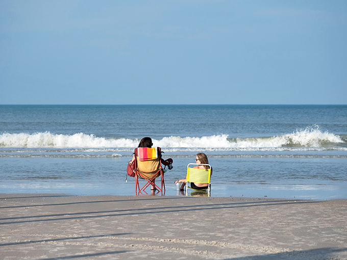 Beach chairs planted firmly in hard-packed sand&mdash;nature's perfect recliner with an ocean soundtrack that no luxury spa can replicate.