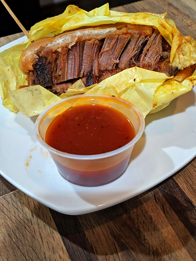 This brisket sandwich isn't just a meal, it's an event. The meat practically surrenders to gravity after its long, smoky journey.