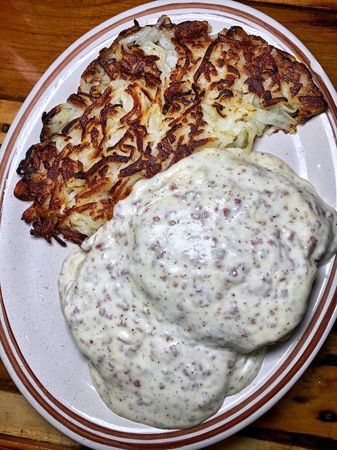 Biscuits and gravy that would make your Southern grandmother nod in approval. That creamy sausage gravy isn't just a topping&mdash;it's a life philosophy.