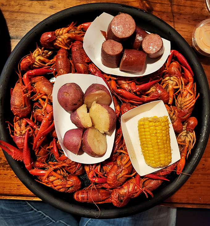 The crawfish motherlode! A perfect spiral of spicy mudbugs with all the fixings. This is what Louisiana dreams are made of.