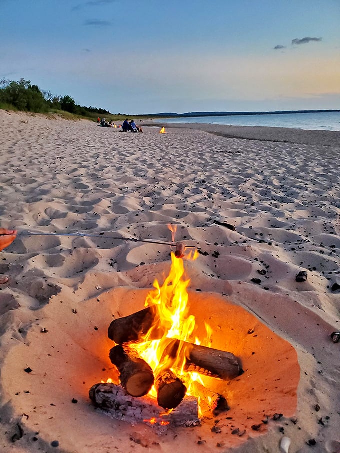 Evening beach bonfires &ndash; where s'mores become gourmet cuisine and ghost stories gain unexpected credibility as darkness falls.