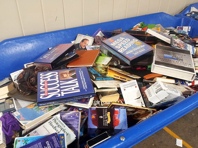 Literary roulette at its finest. "Success Talks" nestled against mystery novels and travel guides&mdash;someone's abandoned wisdom becoming your next bedside companion.