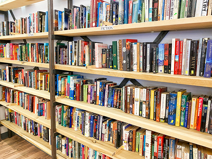 The fiction section rivals small-town libraries. Browse these shelves long enough and you'll either find a first edition or develop reading-induced neck strain.